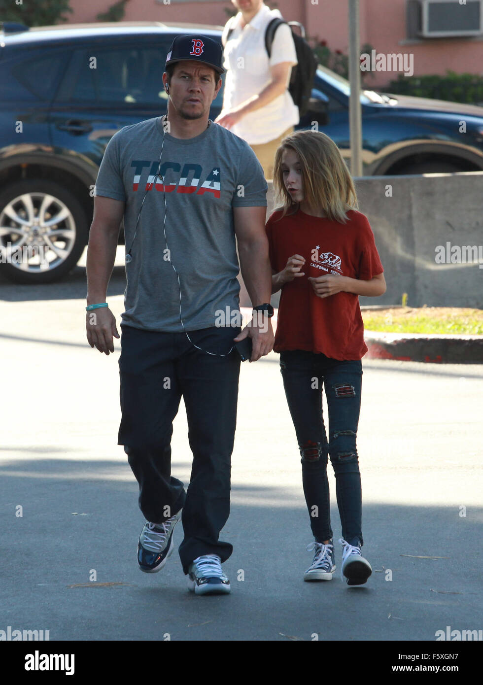 Mark Wahlberg and his daughter Ella Rae Wahlberg pick up red roses at ...