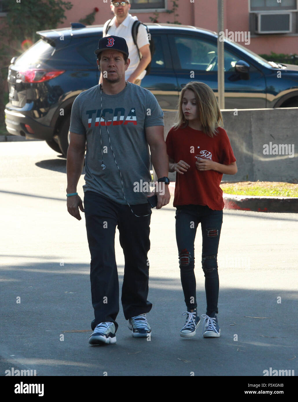 Mark Wahlberg and his daughter Ella Rae Wahlberg pick up red roses at ...