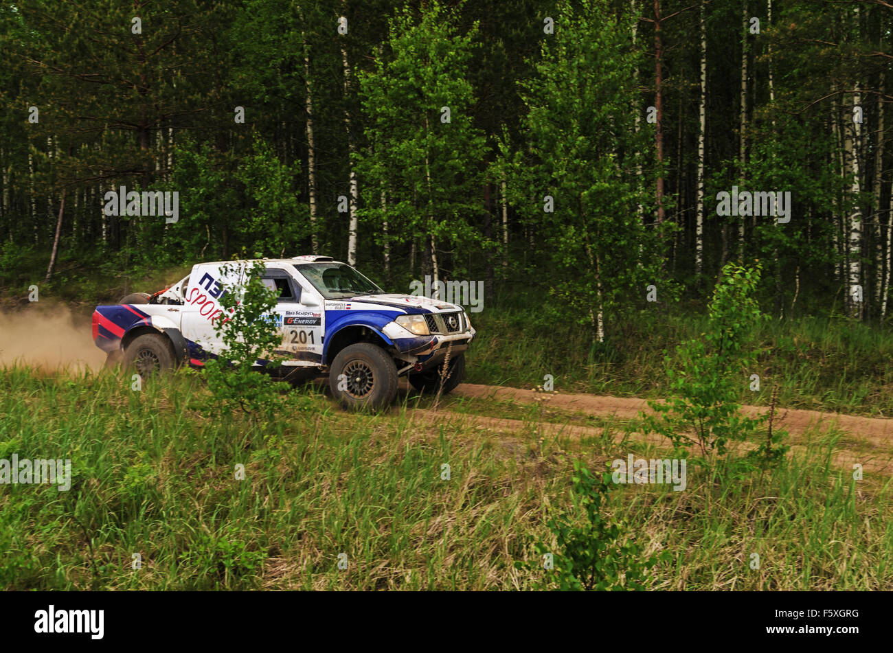 Races on a rally-raid in forest. Rally-raid Baha "Belarus" 2015 ...