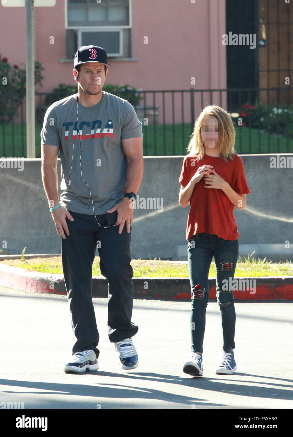 Mark Wahlberg and his daughter Ella Rae Wahlberg pick up red roses at ...