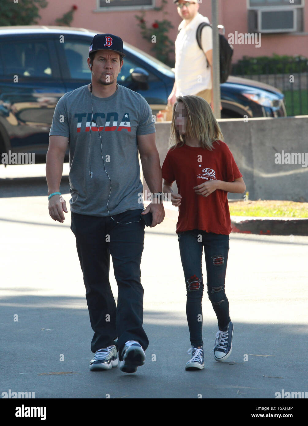 Mark Wahlberg and his daughter Ella Rae Wahlberg pick up red roses at ...