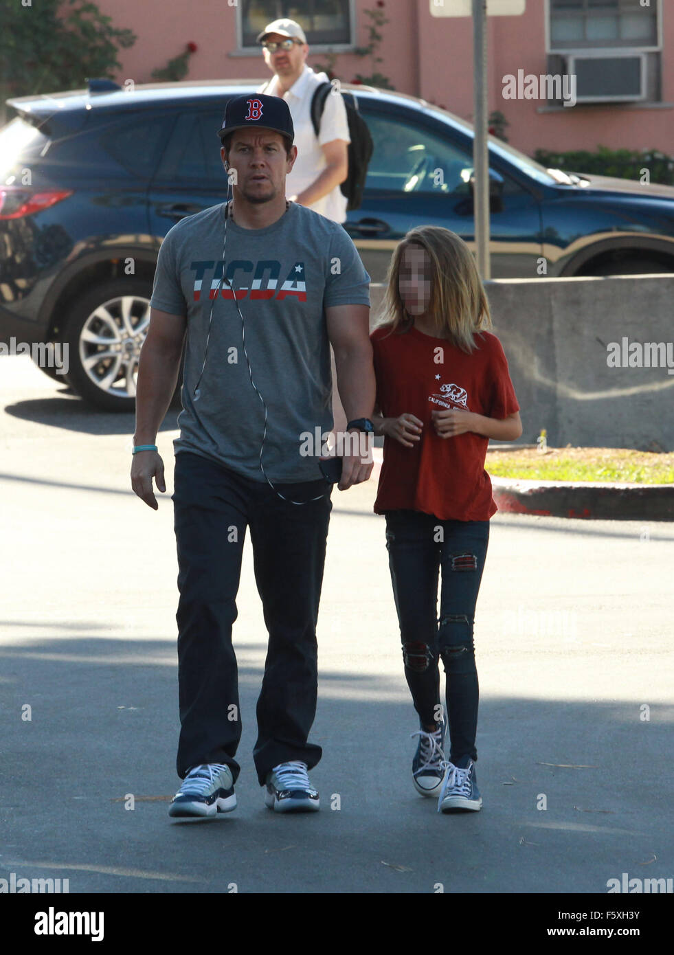 Mark Wahlberg and his daughter Ella Rae Wahlberg pick up red roses at ...