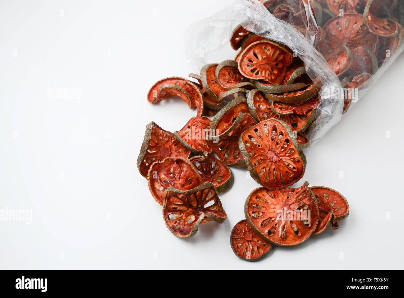 dried quince on white background Stock Photo - Alamy