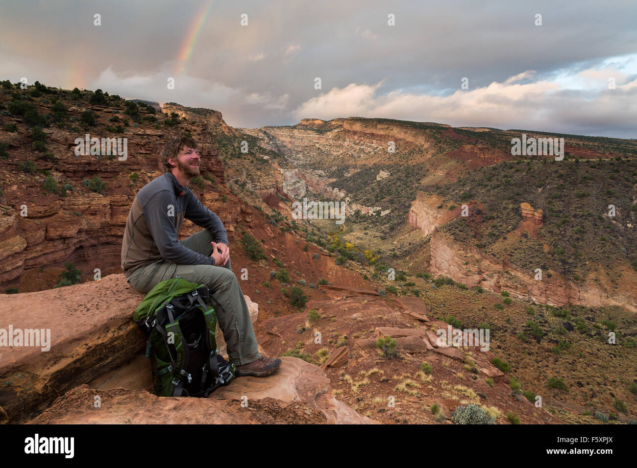 A rainbow arching over the Fremont River Gorge, Capitol Reef National ...