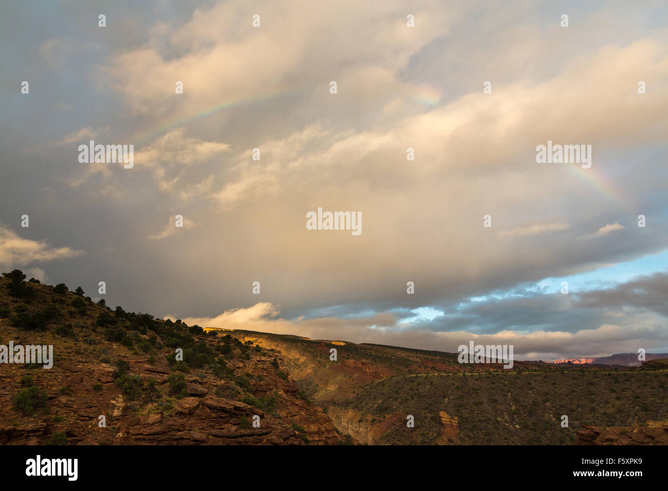 A rainbow arching over the Fremont River Gorge, Capitol Reef National ...