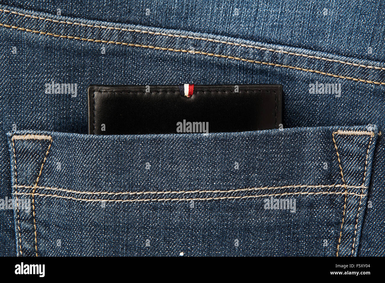 Wallet in Denim Jeans Stock Photo - Alamy