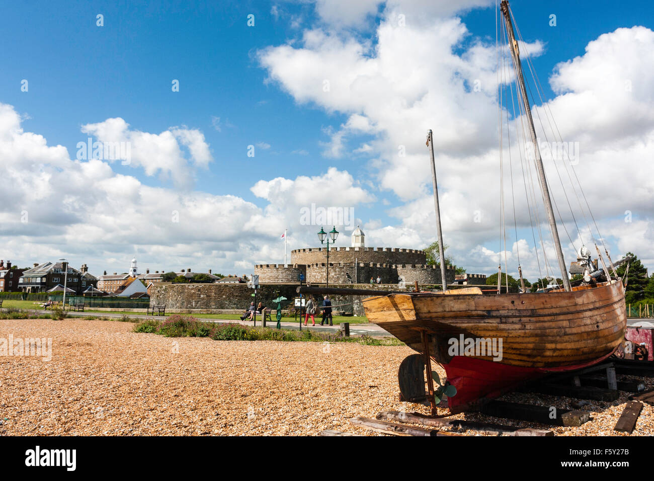 Resort town of Deal, Kent Coast. Fishing boat on shingle beach with the ...