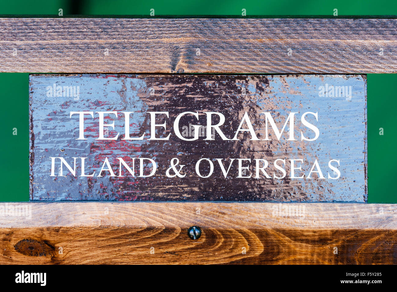 Sign. 'Telegrams, inland and overseas', white lettering on dark ...