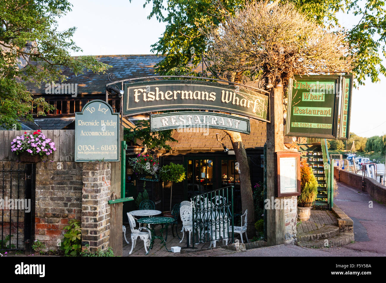'Fishermans Wharf' restaurant sign over the entrance to open outdoor ...