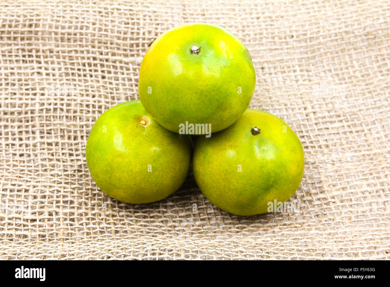 Fresh green tangerine Stock Photo - Alamy