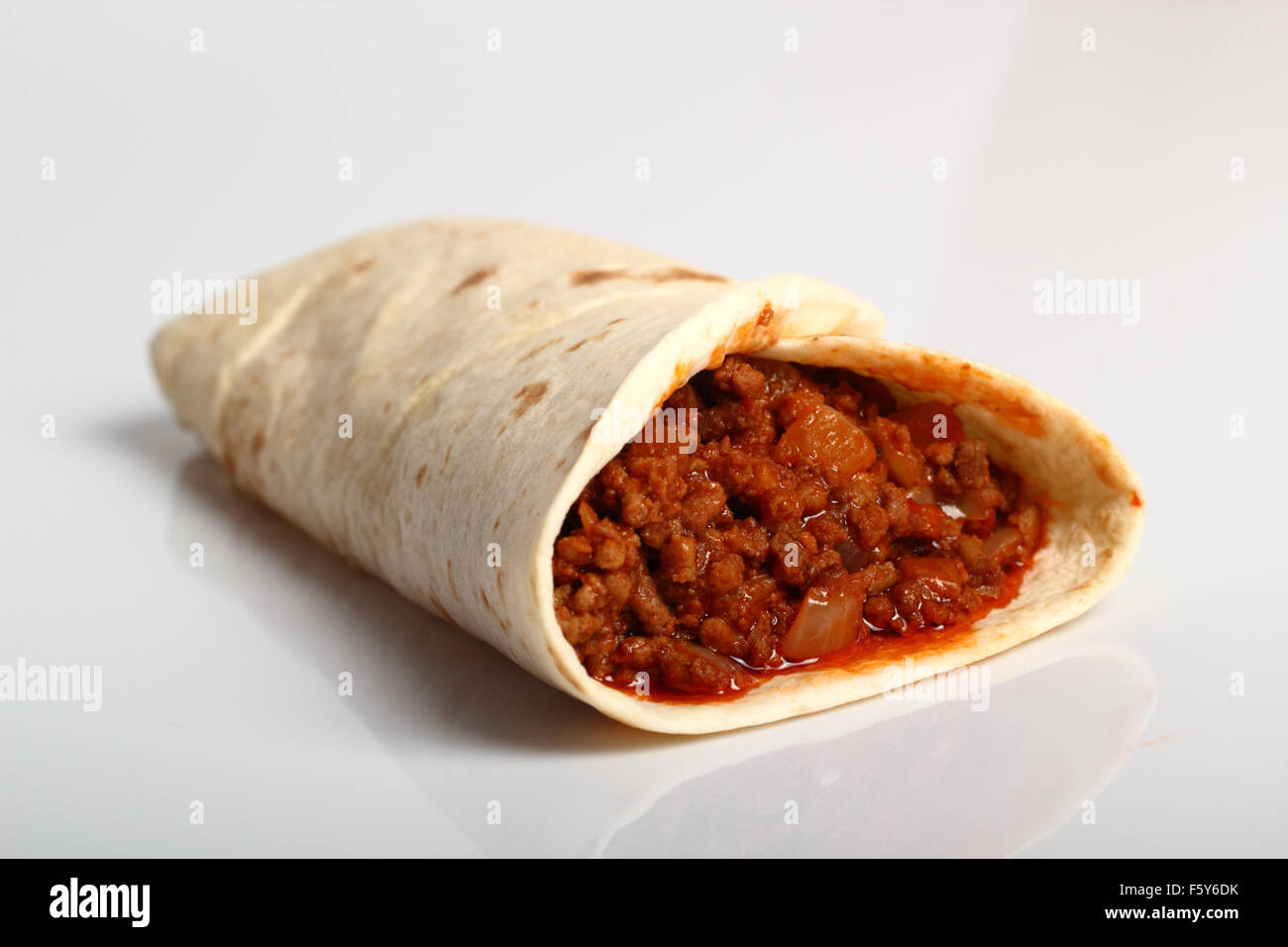 Beef tortilla with chili sauce. Enchilada Stock Photo - Alamy