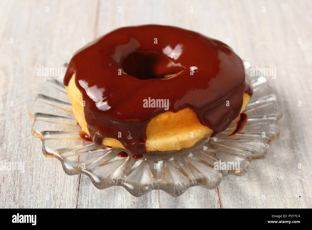 Donut with chocolate glaze Stock Photo - Alamy