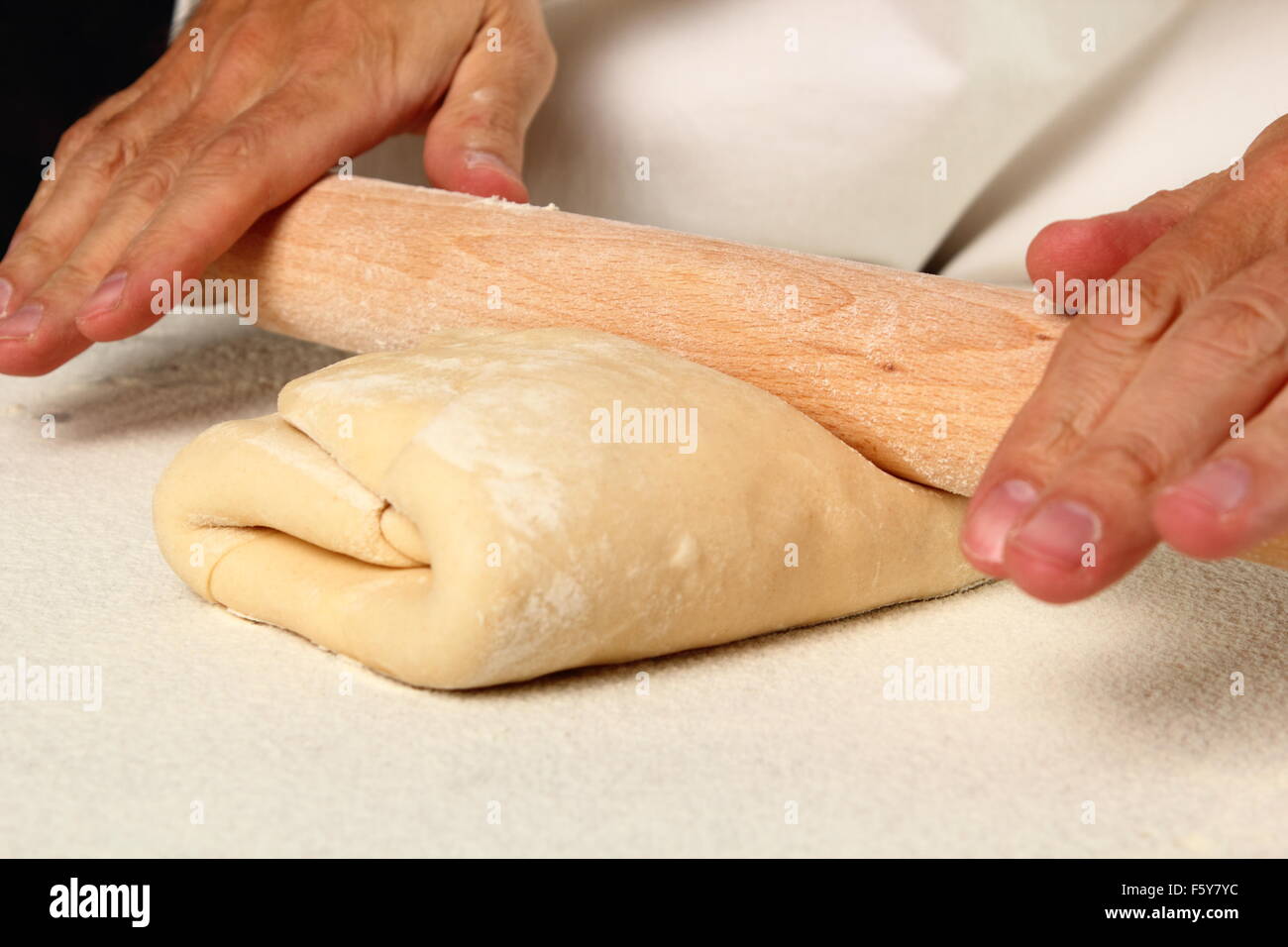 Making Puff Pastry. Rolling dough to rectangle. Next Step Stock Photo ...