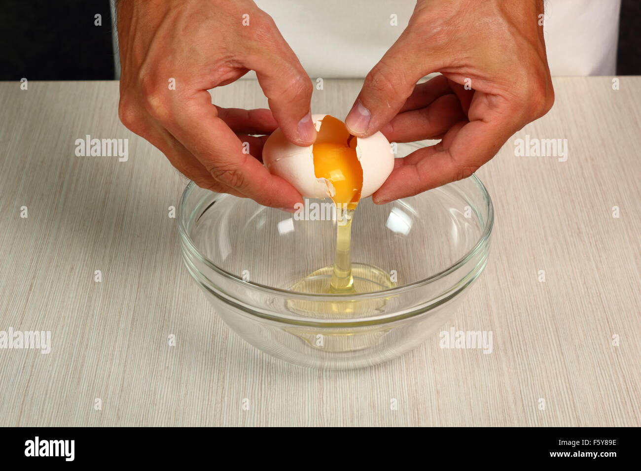 Preparing Dough, cracking egg. Making Yeast Sweet Roll Bun Stock Photo ...
