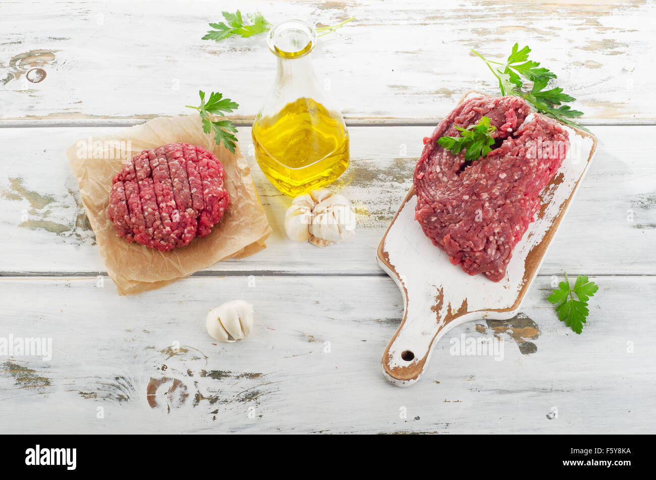 Raw ground beef patties and minced meat. Top view Stock Photo - Alamy