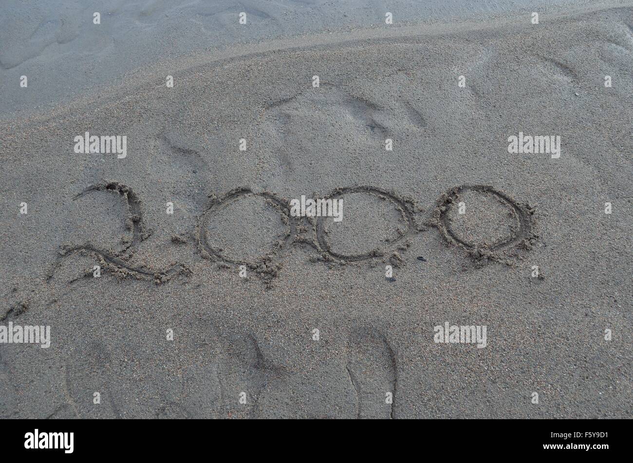 the year two thousand, 2000 written in summer beach sand Stock Photo ...