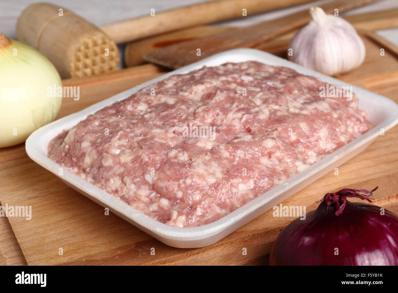 Ground chicken in polystyrene food tray Stock Photo - Alamy