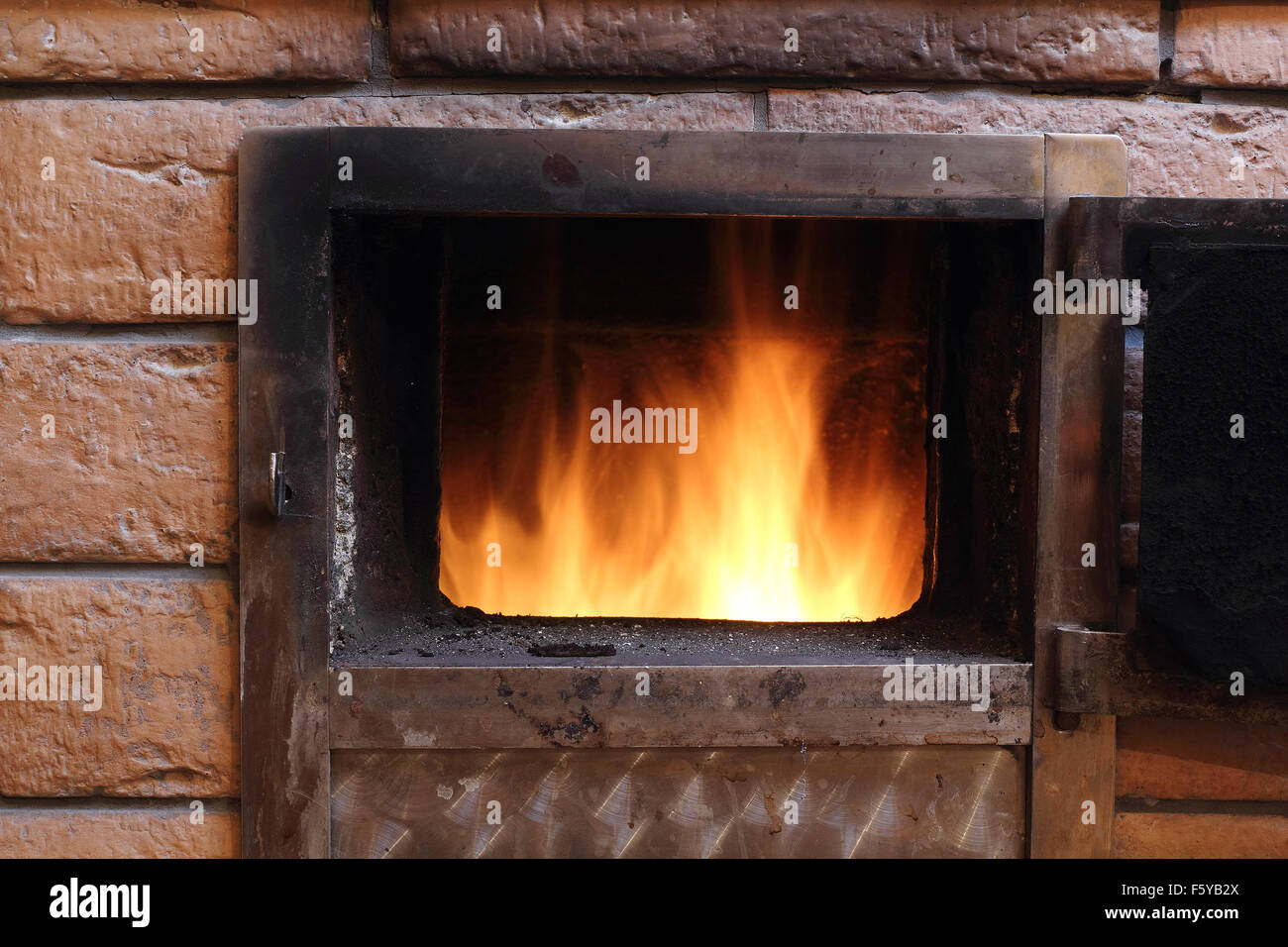 Open fire in oven Stock Photo - Alamy