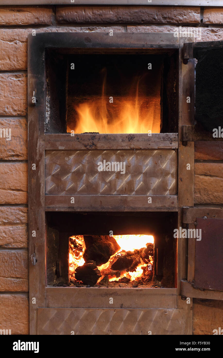Open fire in oven Stock Photo - Alamy