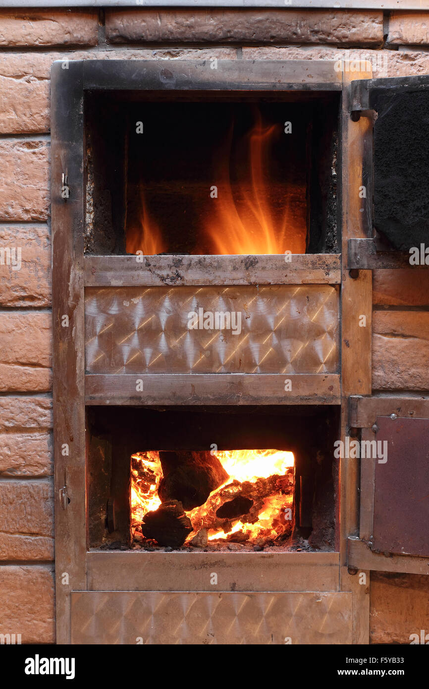 Open fire in oven Stock Photo - Alamy