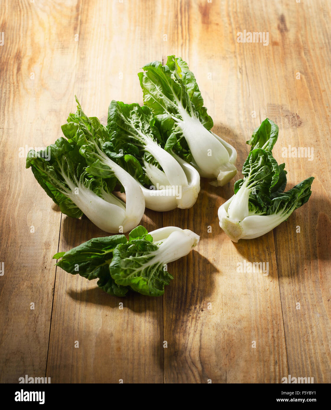 Chinese cabbage, Bok Choy on a old wooden table Stock Photo - Alamy