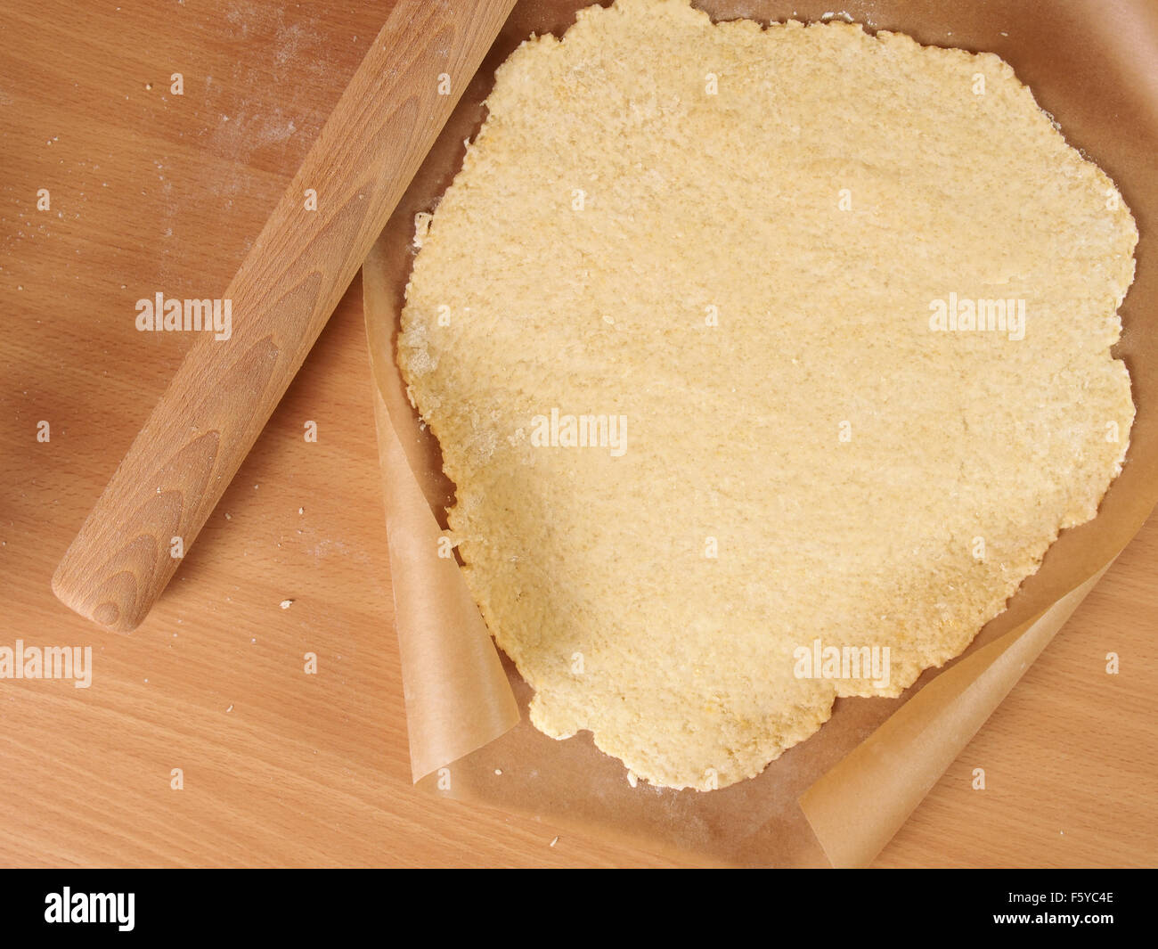 Rolling pastry to round. Making Chocolate Layer Cake with Cream Cheese ...