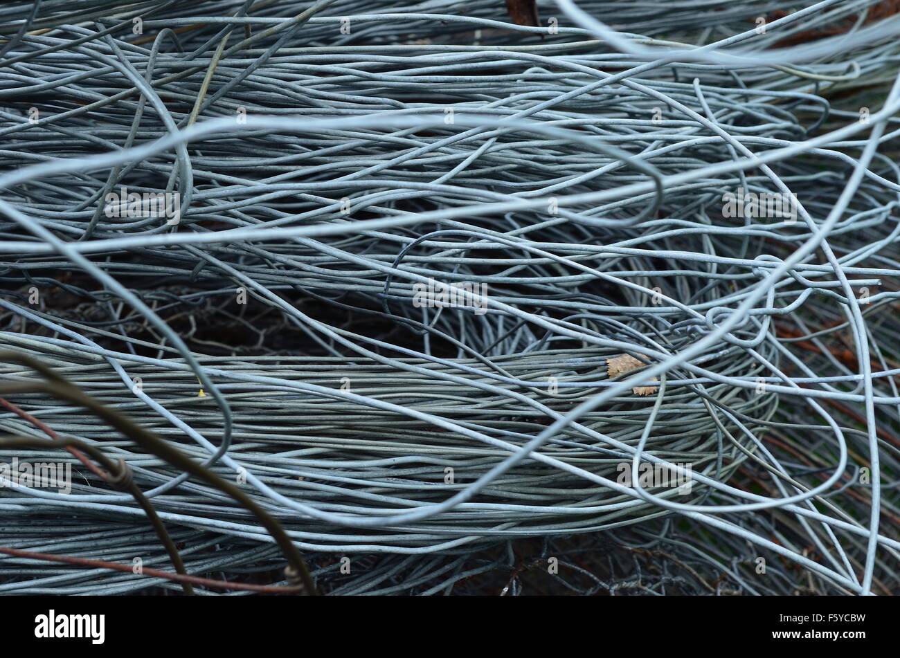 massive metal wire pile background Stock Photo - Alamy