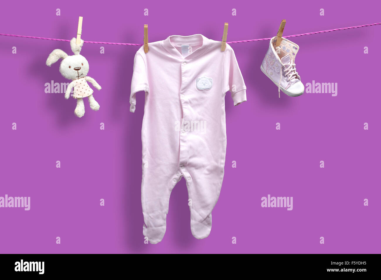 Baby Clothes On The Clothesline Stock Photo Alamy baby-clothes-on-the-clothesline-stock-photo-alamy