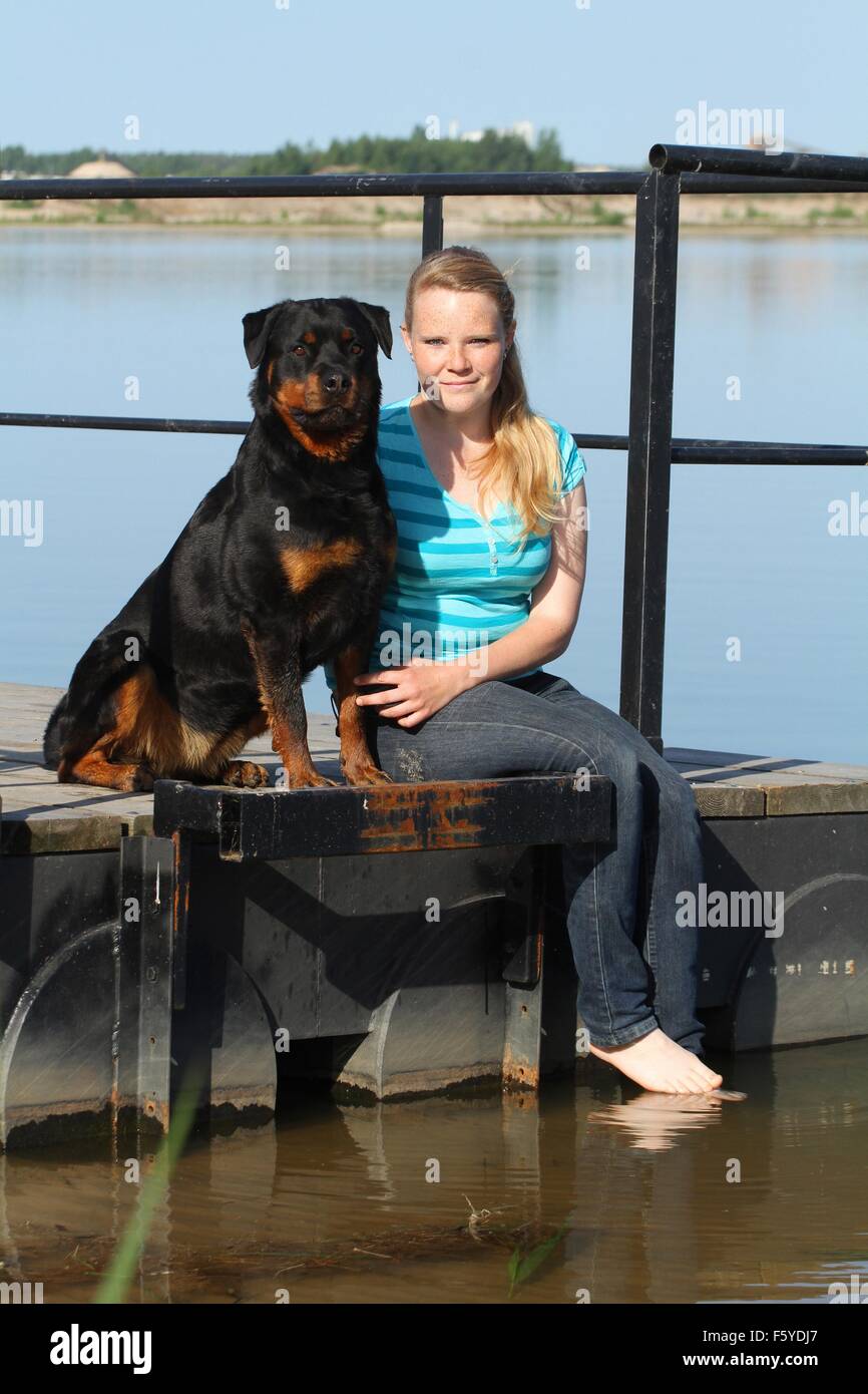 woman and Rottweiler Stock Photo - Alamy