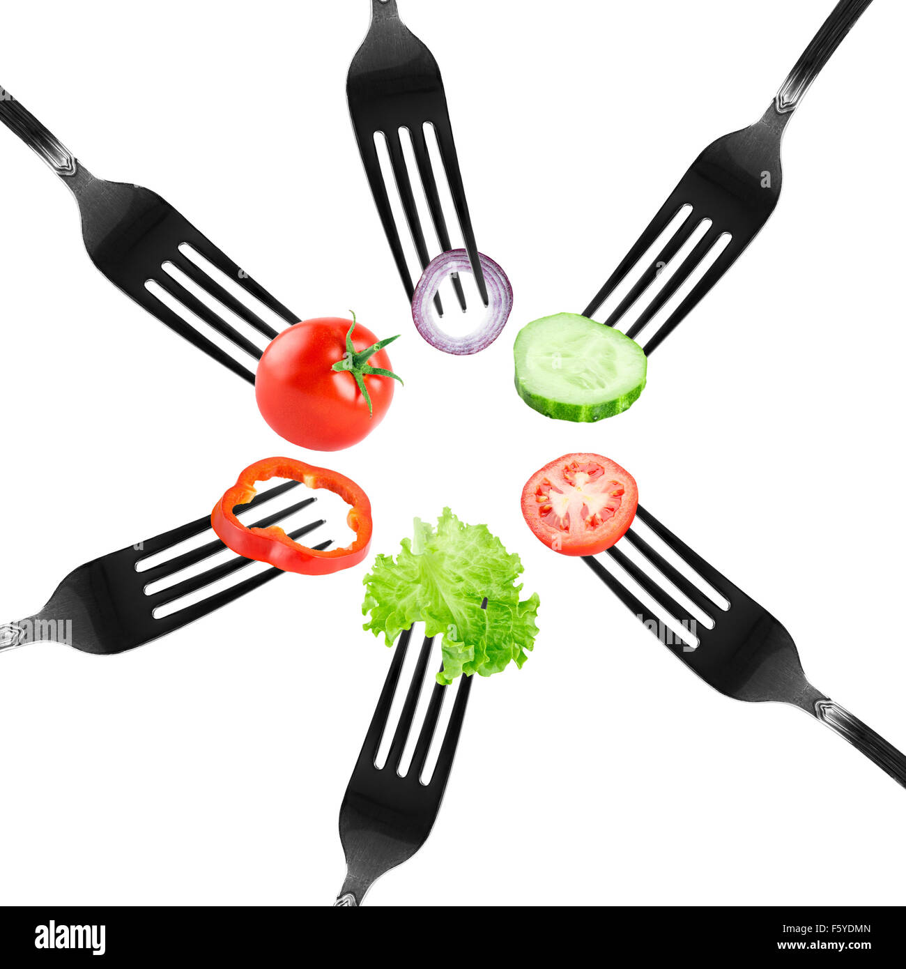 Vegetable on fork on white background. Fresh food Stock Photo - Alamy