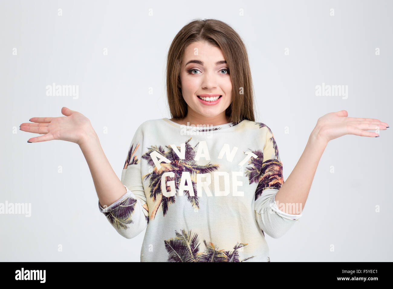 Woman shrugging shoulders hi-res stock photography and images - Alamy