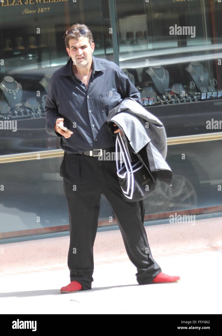 Jason Davis goes shopping in Beverly Hills in ill fitting trousers and ...