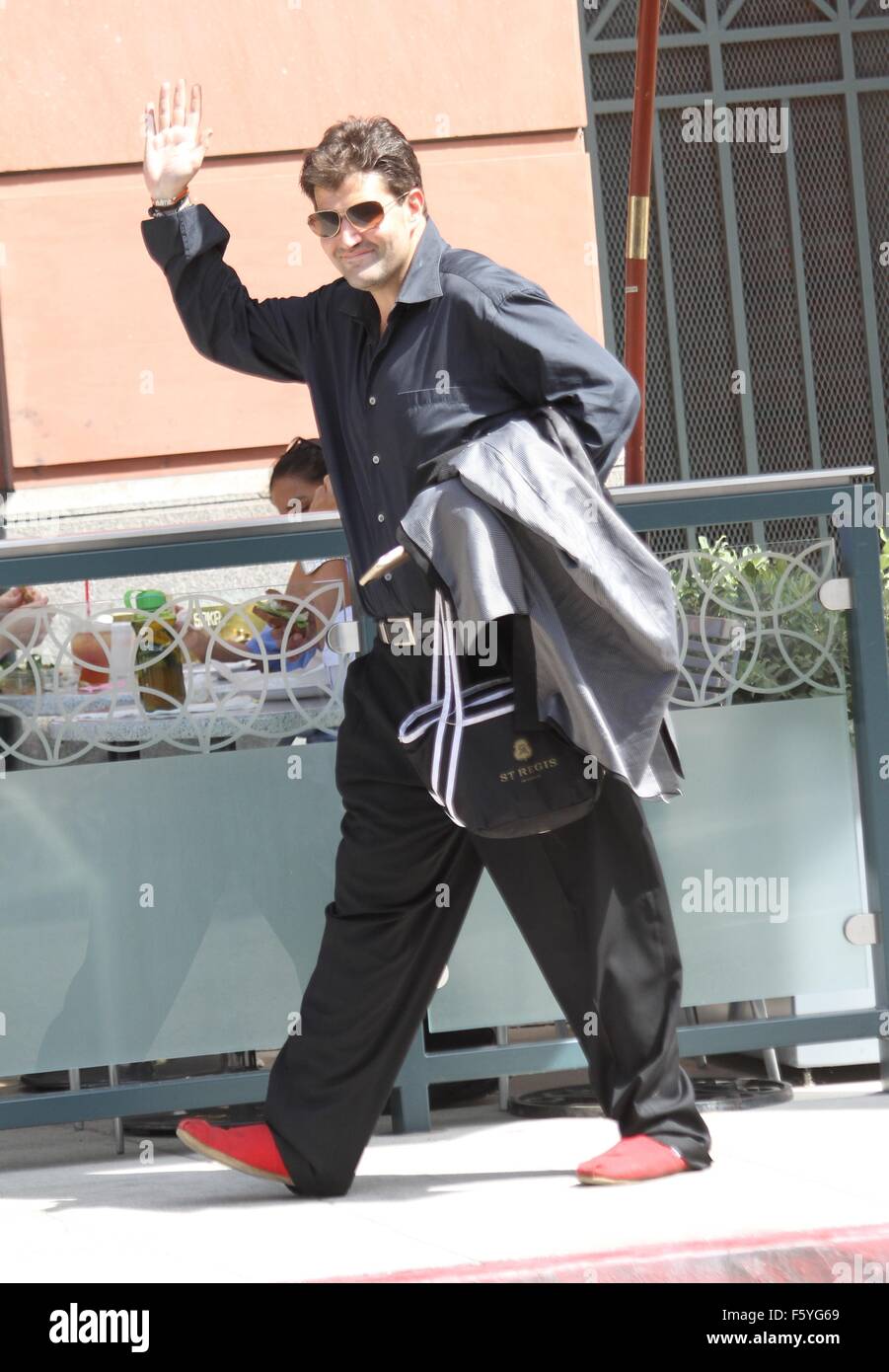 Jason Davis goes shopping in Beverly Hills in ill fitting trousers and ...