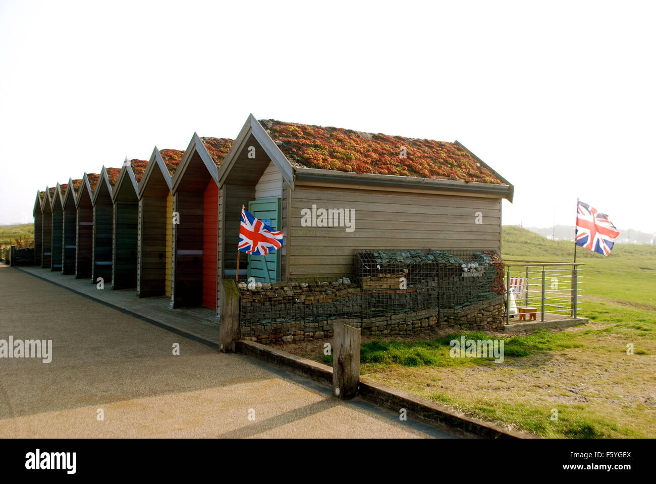 Bright green beach hut hi-res stock photography and images - Alamy