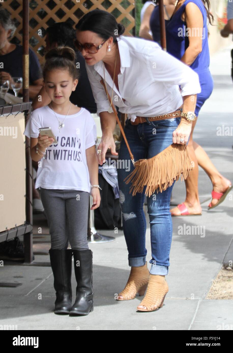 Kyle Richards takes her youngest daughter, Portia, who wore a 'You Can ...