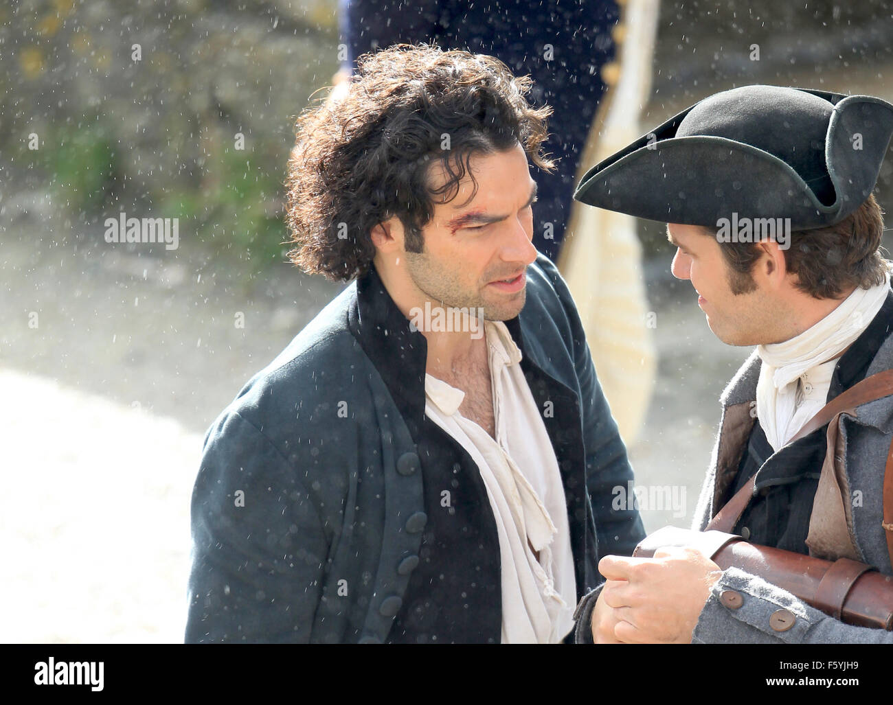 Aidan Turner who plays Poldark in the BBC drama films a scene where he ...