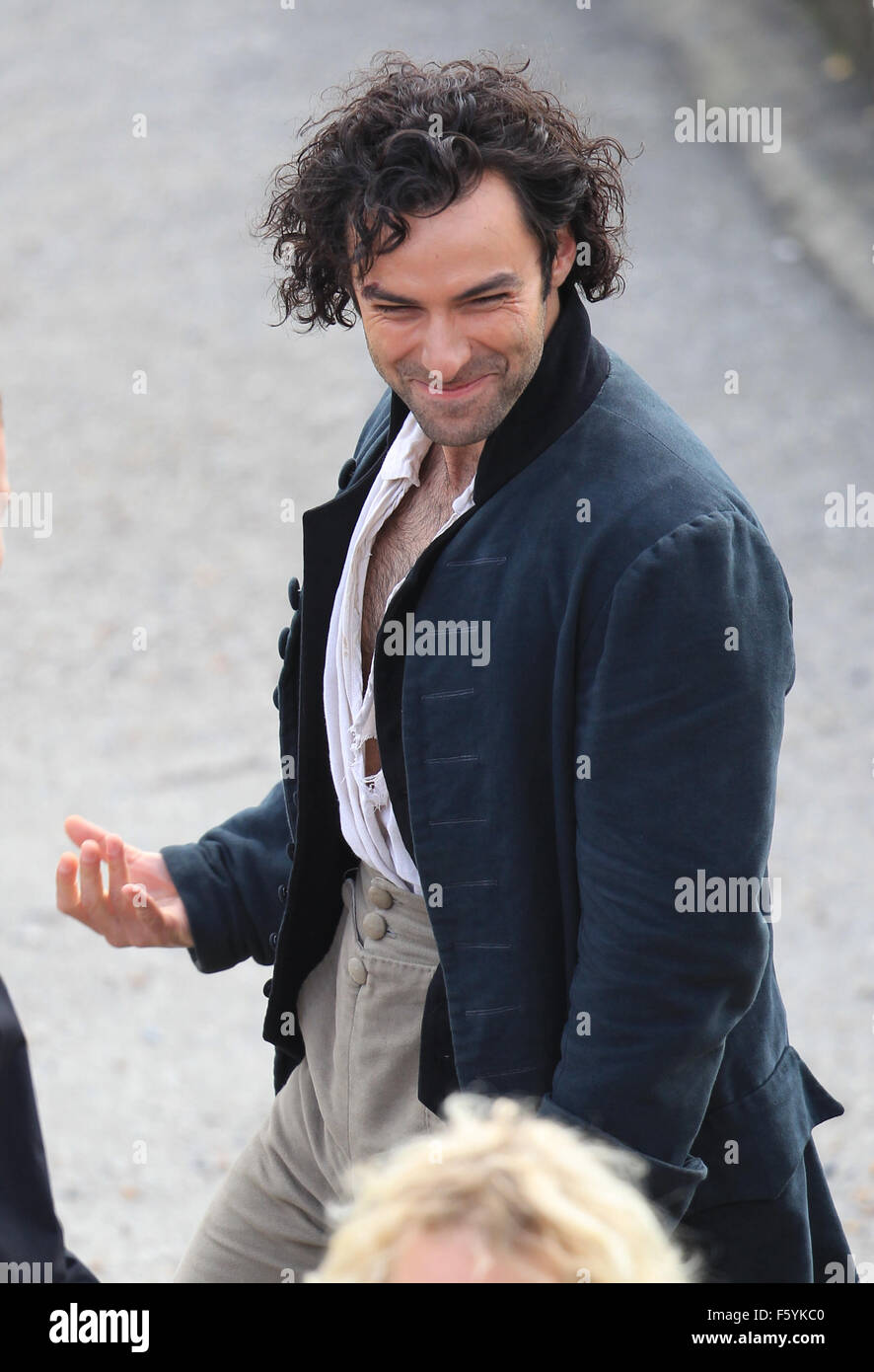 Aidan Turner who plays Poldark in the BBC drama films a scene where he ...