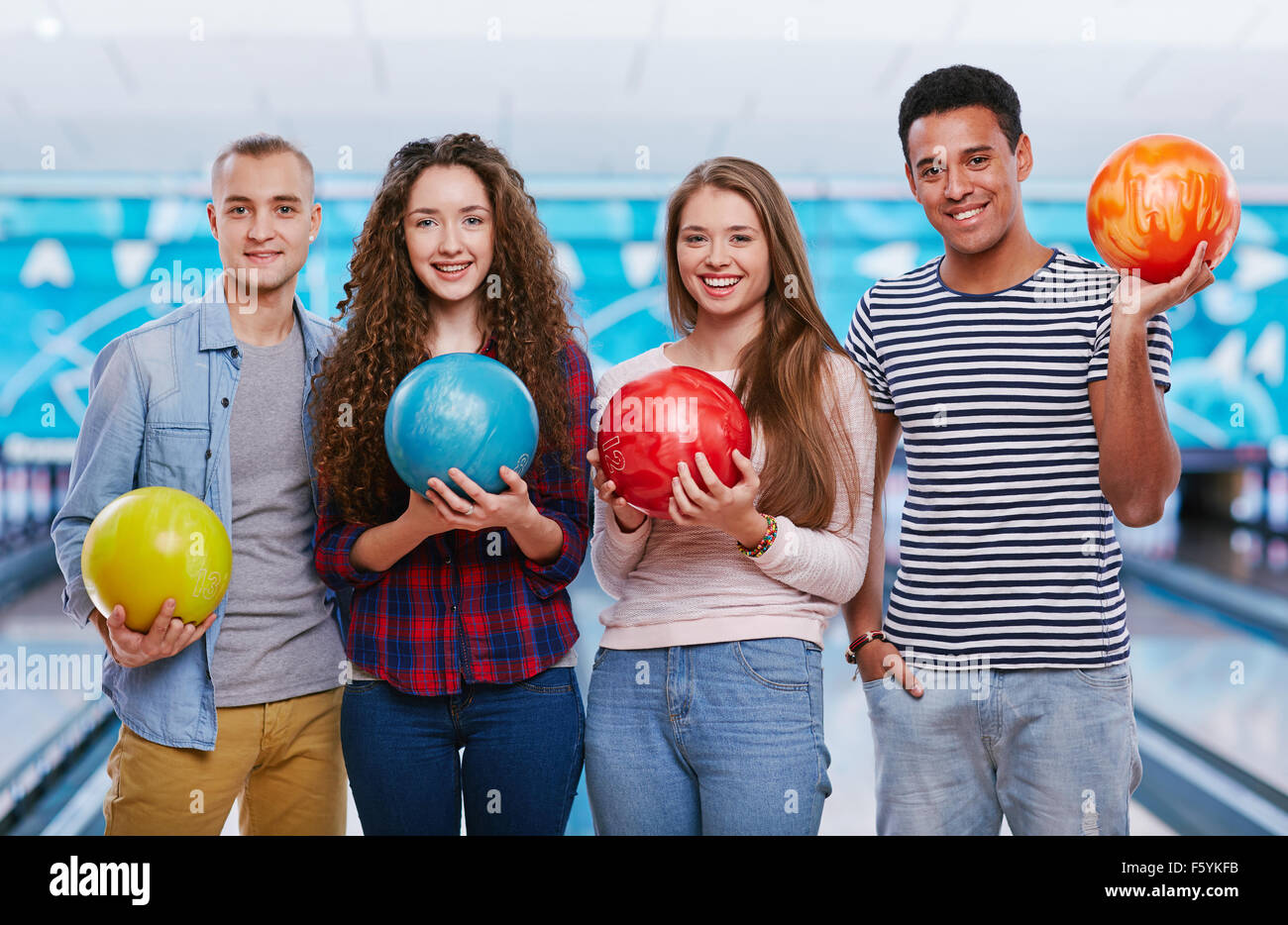 Woman at a bowling alley hi-res stock photography and images - Alamy