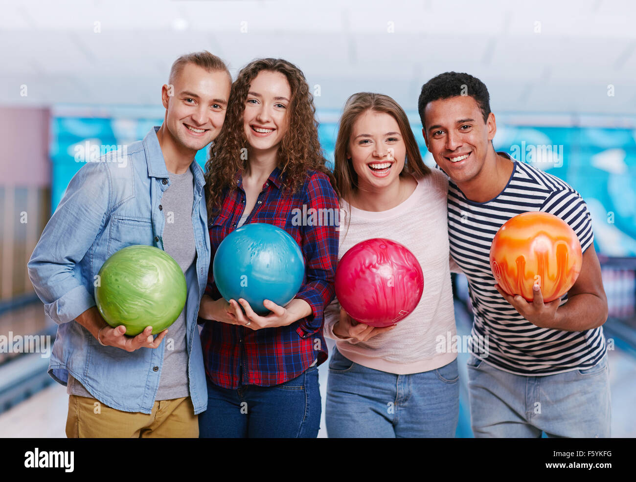 Portrait of best friends at the bowling alley Stock Photo - Alamy
