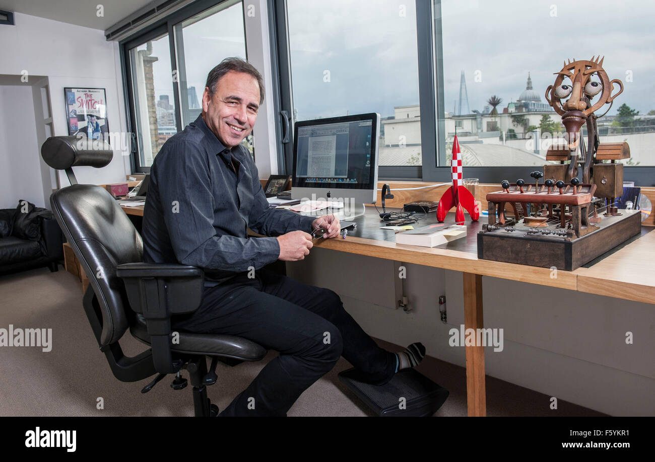 Writer Anthony Horowitz at desk in his home office Stock Photo - Alamy