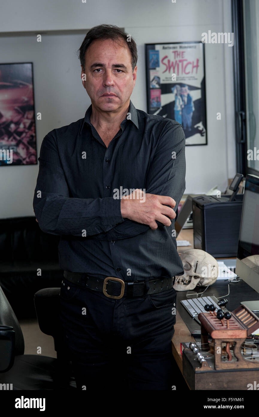 Writer Anthony Horowitz at desk in his home office Stock Photo - Alamy