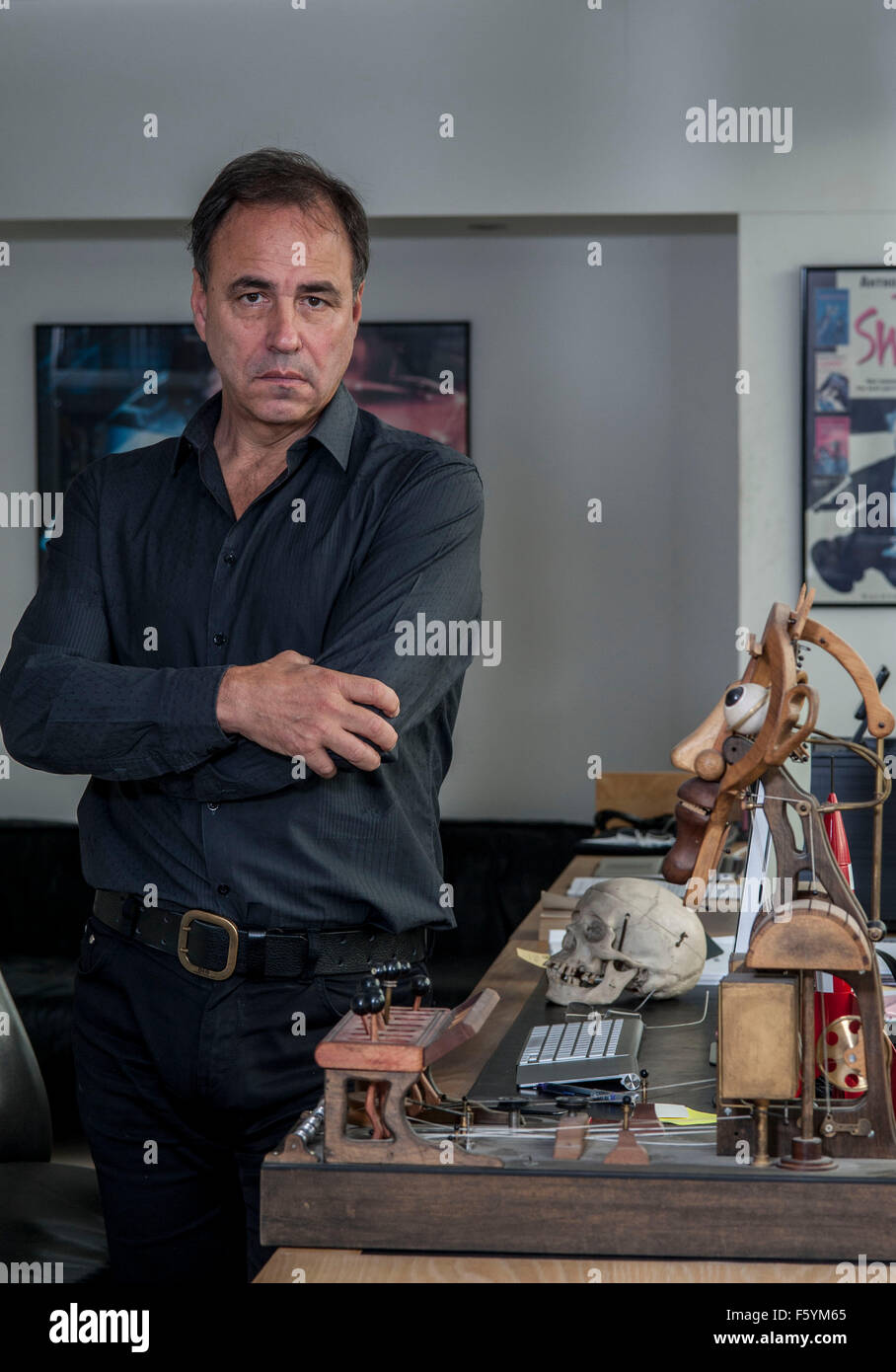 Writer Anthony Horowitz at desk in his home office Stock Photo - Alamy