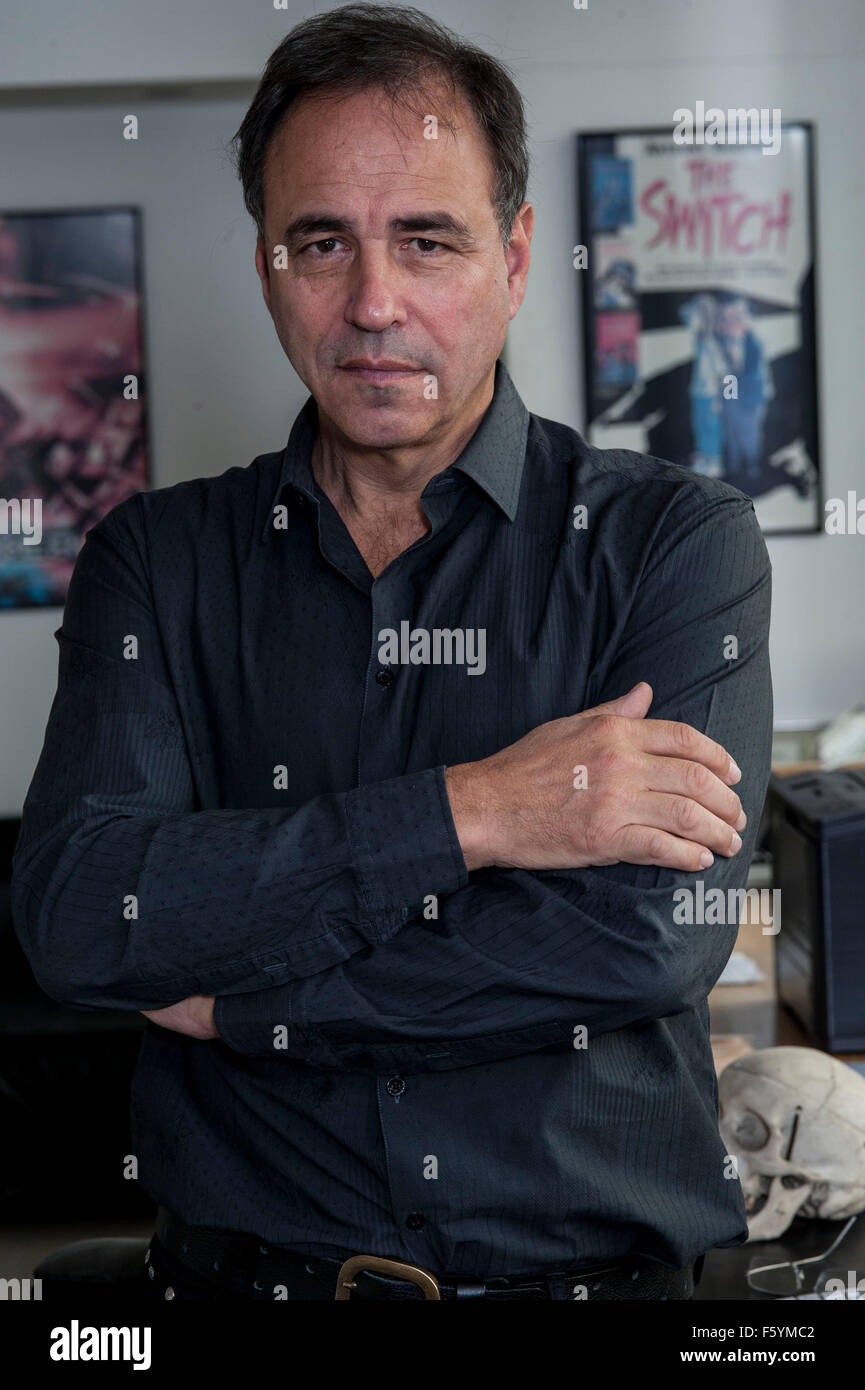 Writer Anthony Horowitz at desk in his home office Stock Photo - Alamy