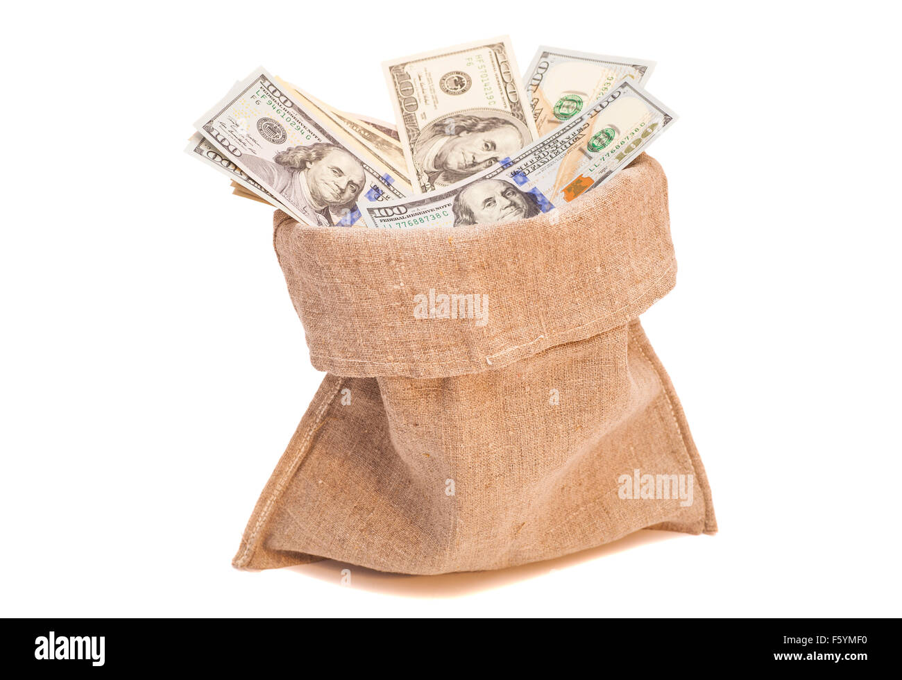 Money bag with dollars isolated on white Stock Photo - Alamy