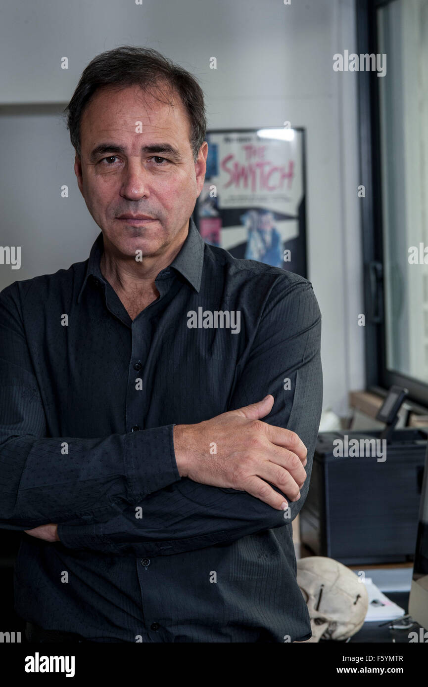 Writer Anthony Horowitz at desk in his home office Stock Photo - Alamy