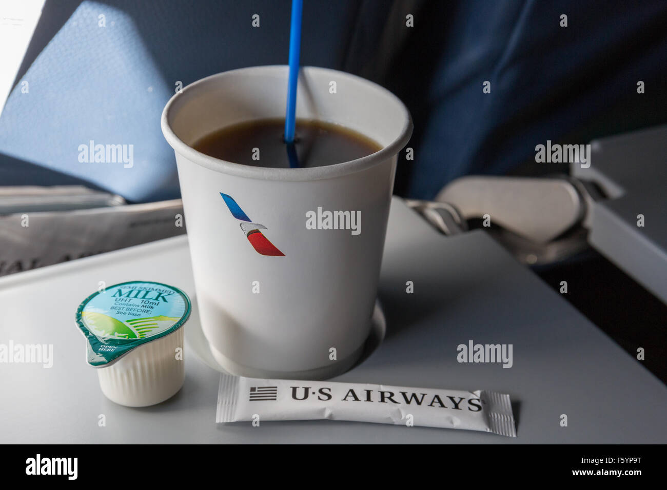 A US Airways sugar sachet and an American Airlines coffee cup Stock ...
