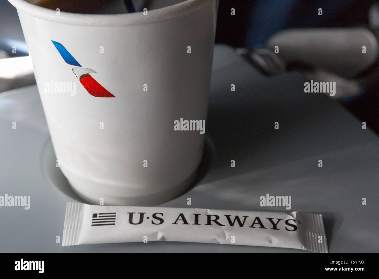 A US Airways sugar sachet and an American Airlines coffee cup Stock ...