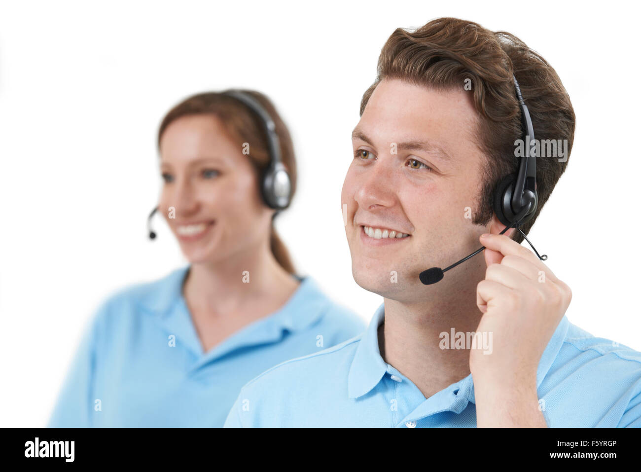Staff Answering Calls In Customer Service Department Stock Photo - Alamy