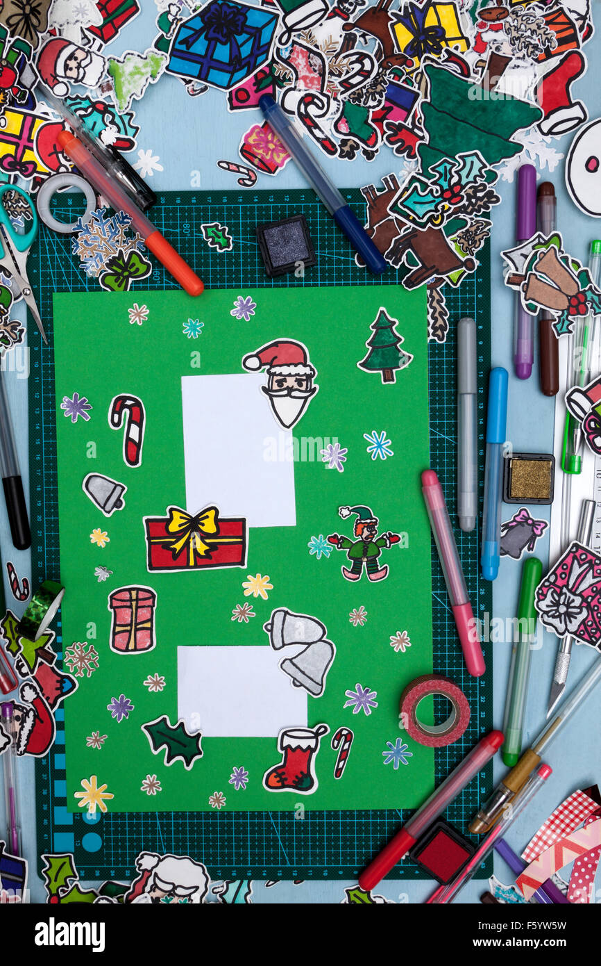 a horizontal overhead view of a scrapbook xmas layout with some of the ...