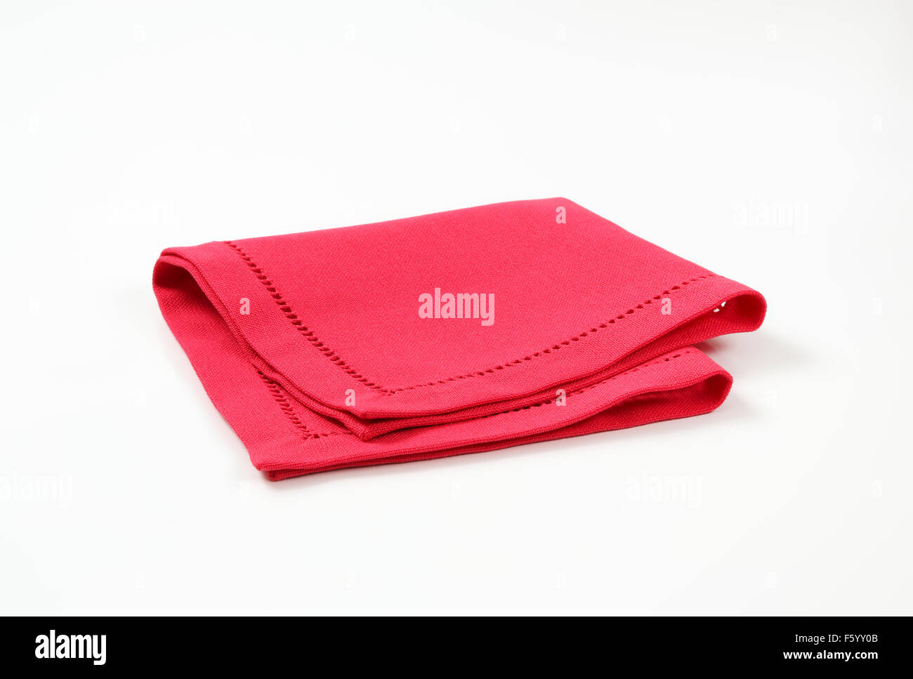 red place mat on white background Stock Photo - Alamy